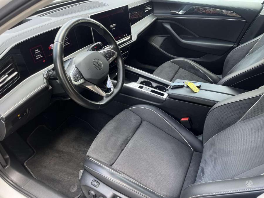 White Volkswagen Passat 2024 in Vilnius, with an engine capacity of 1.97 L and mileage of 172 thousand km for 23900 €, photo 10 on AUTOMOTO.COM.LV