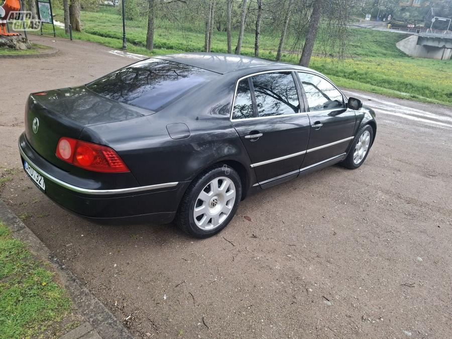 Melns Volkswagen Phaeton 2004 Kretinga, ar dzinēja tilpumu 5.00 L un nobraukumu 316 tūkst. km par 2100 €, foto 7 vietnē AUTOMOTO.COM.LV