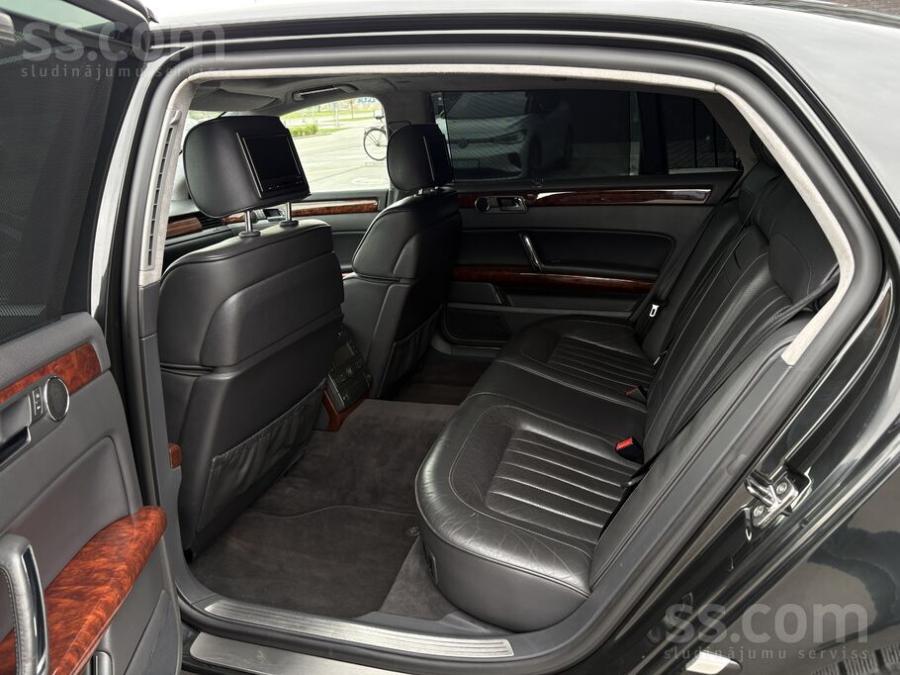 Melns Volkswagen Phaeton 2004 Rīga, ar dzinēja tilpumu 6.00 L un nobraukumu 151 tūkst. km par 12000 €, foto 26 vietnē AUTOMOTO.COM.LV