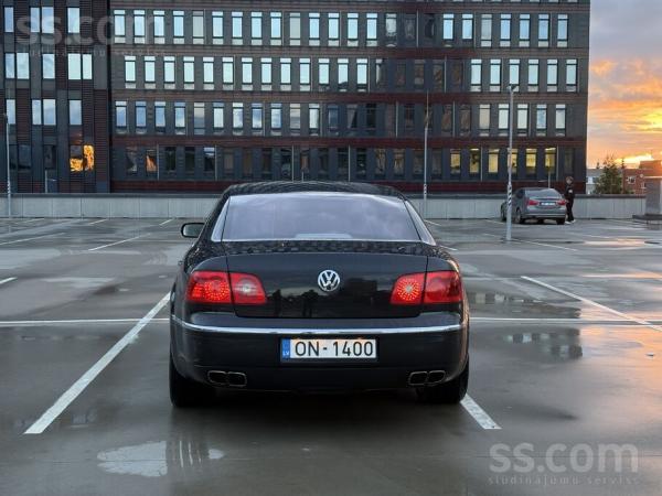 Black Volkswagen Phaeton 2004 in Riga, with an engine capacity of 6.00 L and mileage of 151 thousand km for 12000 €, photo 6 on AUTOMOTO.COM.LV