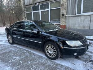 Black Volkswagen Phaeton 2005 in Riga, with an engine capacity of 3.00 L and mileage of 214 thousand km for 4000 €, photo 11 on AUTOMOTO.COM.LV