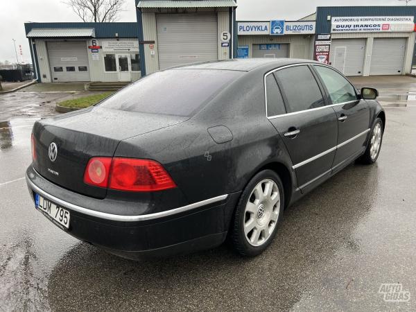 Black Volkswagen Phaeton 2005 in Klaipeda, with an engine capacity of 3.00 L and mileage of 305 thousand km for 2500 €, photo 5 on AUTOMOTO.COM.LV