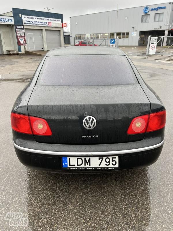 Black Volkswagen Phaeton 2005 in Klaipeda, with an engine capacity of 3.00 L and mileage of 305 thousand km for 2500 €, photo 6 on AUTOMOTO.COM.LV