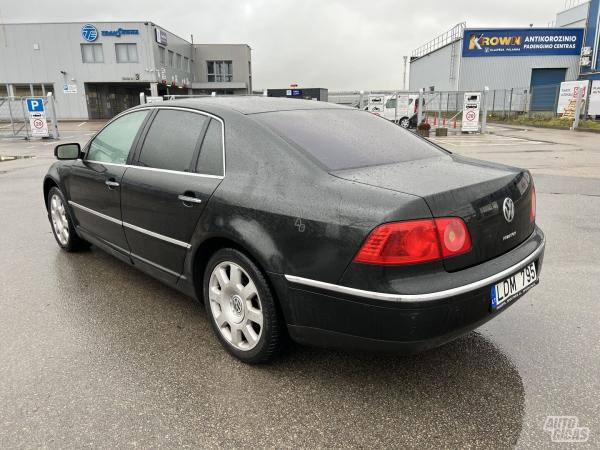 Black Volkswagen Phaeton 2005 in Klaipeda, with an engine capacity of 3.00 L and mileage of 305 thousand km for 2500 €, photo 7 on AUTOMOTO.COM.LV