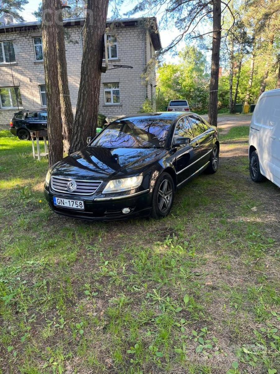 Black Volkswagen Phaeton 2006 in Riga, with an engine capacity of 4.20 L and mileage of 164 thousand km for 6500 €, photo 1 on AUTOMOTO.COM.LV