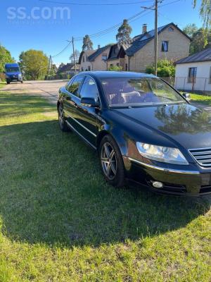 Black Volkswagen Phaeton 2006 in Riga, with an engine capacity of 4.20 L and mileage of 164 thousand km for 6500 €, photo 6 on AUTOMOTO.COM.LV