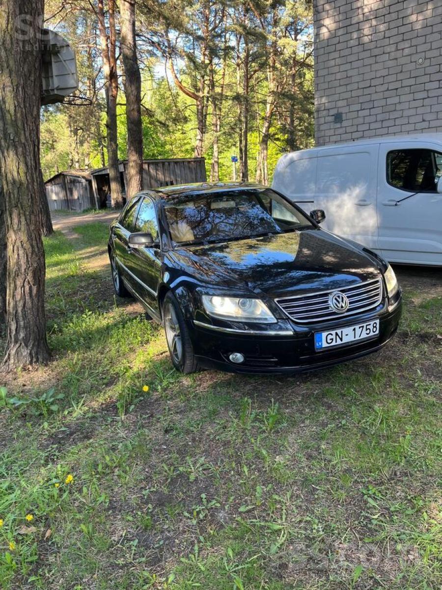 Black Volkswagen Phaeton 2006 in Riga, with an engine capacity of 4.20 L and mileage of 164 thousand km for 6500 €, photo 19 on AUTOMOTO.COM.LV