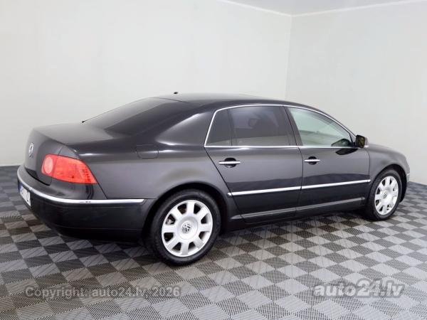 Melns Volkswagen Phaeton 2007 Tallina, ar dzinēja tilpumu 3.00 L un nobraukumu 354 tūkst. km par 2499 €, foto 3 vietnē AUTOMOTO.COM.LV