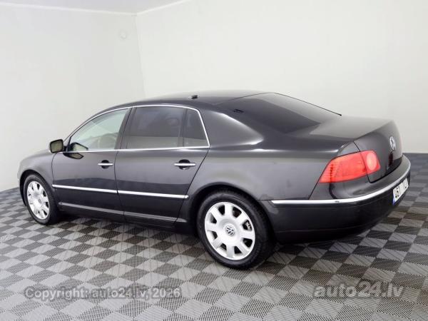 Melns Volkswagen Phaeton 2007 Tallina, ar dzinēja tilpumu 3.00 L un nobraukumu 354 tūkst. km par 2499 €, foto 4 vietnē AUTOMOTO.COM.LV