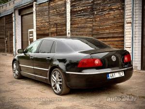 Black Volkswagen Phaeton 2007 in Tallinn, with an engine capacity of 3.00 L and mileage of 400 thousand km for 3499 €, photo 3 on AUTOMOTO.COM.LV