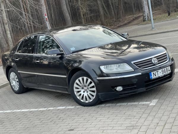 Black Volkswagen Phaeton 2007 in Riga, with an engine capacity of 3.00 L and mileage of 295 thousand km for 4250 €, photo 3 on AUTOMOTO.COM.LV