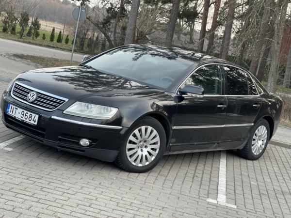 Black Volkswagen Phaeton 2007 in Riga, with an engine capacity of 3.00 L and mileage of 295 thousand km for 4250 €, photo 4 on AUTOMOTO.COM.LV