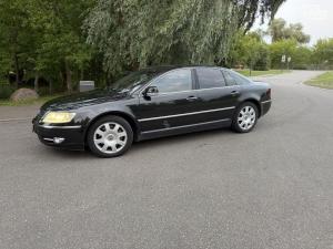 Black Volkswagen Phaeton 2007 in Panevezys, with an engine capacity of 3.00 L and mileage of 335 thousand km for 1500 €, photo 4 on AUTOMOTO.COM.LV