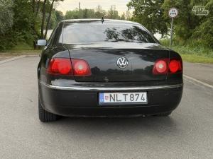 Black Volkswagen Phaeton 2007 in Panevezys, with an engine capacity of 3.00 L and mileage of 335 thousand km for 1500 €, photo 6 on AUTOMOTO.COM.LV