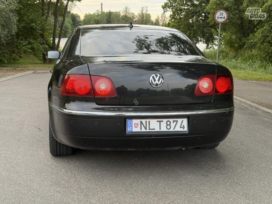 Black Volkswagen Phaeton 2007 in Panevezys, with an engine capacity of 3.00 L and mileage of 335 thousand km for 1500 €, photo 6 on AUTOMOTO.COM.LV