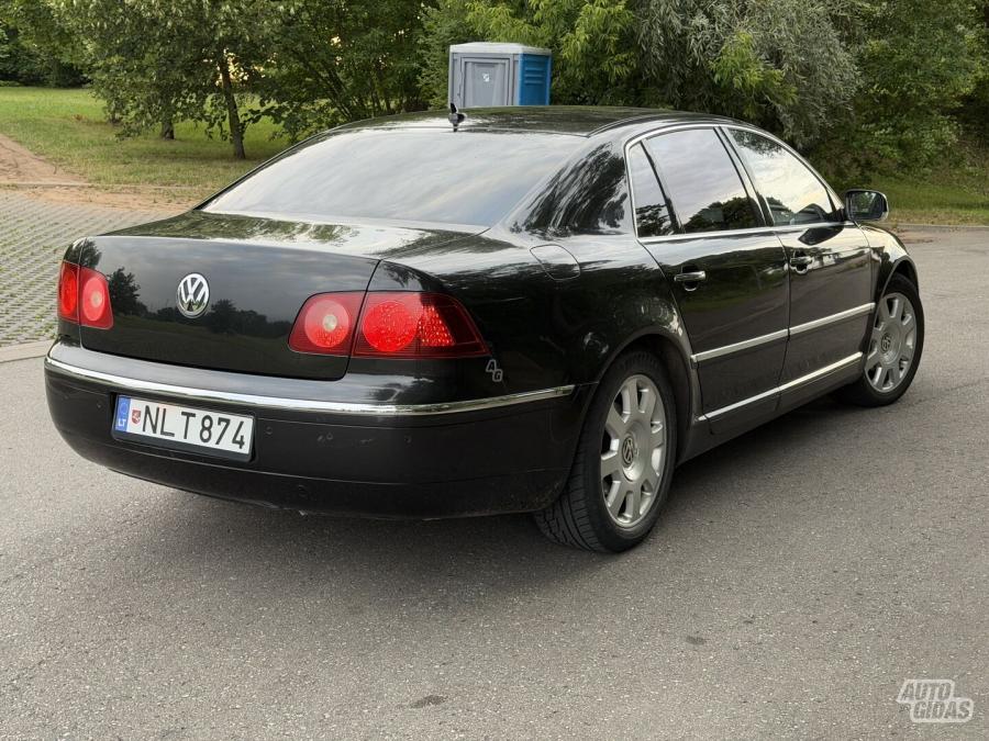 Black Volkswagen Phaeton 2007 in Panevezys, with an engine capacity of 3.00 L and mileage of 335 thousand km for 1500 €, photo 7 on AUTOMOTO.COM.LV