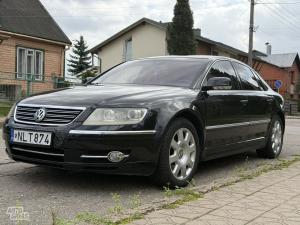 Black Volkswagen Phaeton 2007 in Panevezys, with an engine capacity of 3.00 L and mileage of 335 thousand km for 1500 €, photo 12 on AUTOMOTO.COM.LV