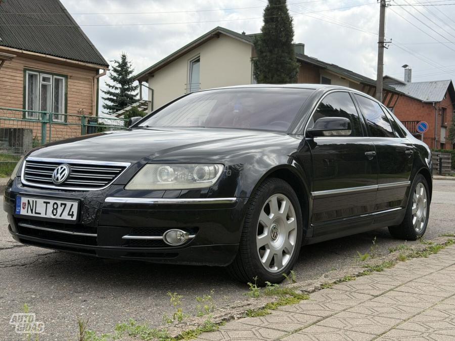Black Volkswagen Phaeton 2007 in Panevezys, with an engine capacity of 3.00 L and mileage of 335 thousand km for 1500 €, photo 12 on AUTOMOTO.COM.LV