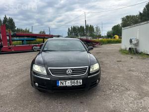 Black Volkswagen Phaeton 2007 in Riga, with an engine capacity of 3.00 L and mileage of 296 thousand km for 1990 €, photo  on AUTOMOTO.COM.LV