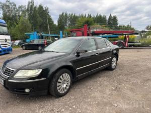 Black Volkswagen Phaeton 2007 in Riga, with an engine capacity of 3.00 L and mileage of 296 thousand km for 1990 €, photo 3 on AUTOMOTO.COM.LV