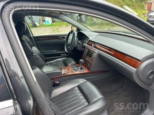Black Volkswagen Phaeton 2007 in Riga, with an engine capacity of 3.00 L and mileage of 296 thousand km for 1990 €, photo 8 on AUTOMOTO.COM.LV