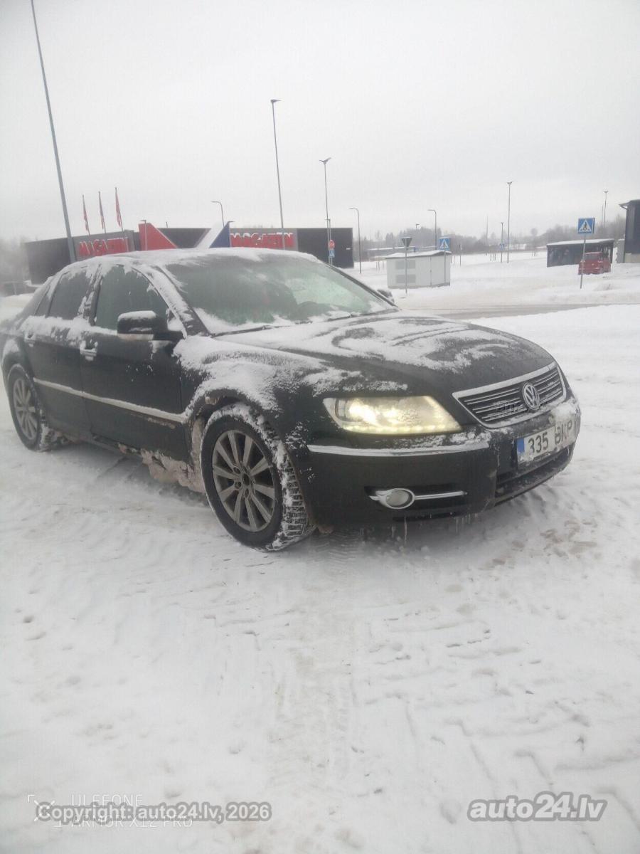 Black Volkswagen Phaeton 2008 in Tallinn, with an engine capacity of 3.00 L and mileage of 420 thousand km for 2499 €, photo 3 on AUTOMOTO.COM.LV