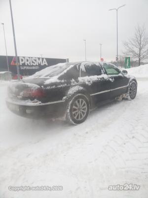 Melns Volkswagen Phaeton 2008 Rapla, ar dzinēja tilpumu 3.00 L un nobraukumu 420 tūkst. km par 3499 €, foto 4 vietnē AUTOMOTO.COM.LV