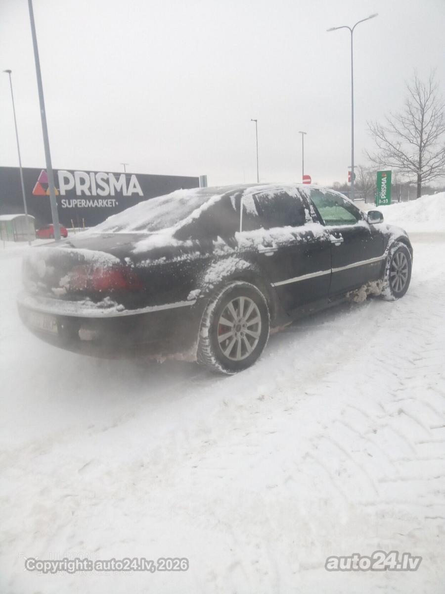 Melns Volkswagen Phaeton 2008 Rapla, ar dzinēja tilpumu 3.00 L un nobraukumu 420 tūkst. km par 3499 €, foto 4 vietnē AUTOMOTO.COM.LV
