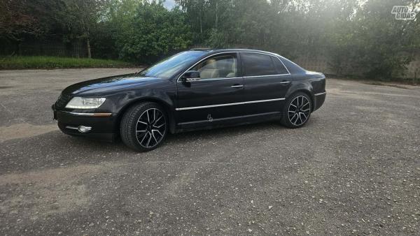 Melns Volkswagen Phaeton 2008 Kupiškis, ar dzinēja tilpumu 3.00 L un nobraukumu 432 tūkst. km par 2000 €, foto 5 vietnē AUTOMOTO.COM.LV