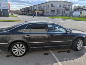 Black Volkswagen Phaeton 2009 in Riga, with an engine capacity of 3.00 L and mileage of 291 thousand km for 4500 €, photo 7 on AUTOMOTO.COM.LV