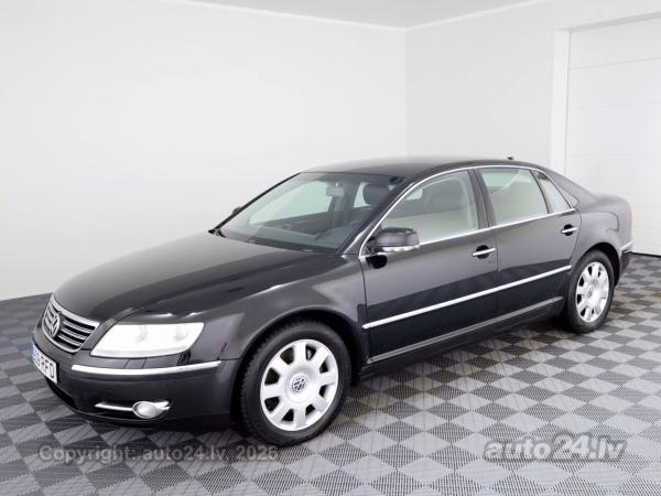 Melns Volkswagen Phaeton 2009 Tallina, ar dzinēja tilpumu 3.00 L un nobraukumu 267 tūkst. km par 3699 €, foto 2 vietnē AUTOMOTO.COM.LV