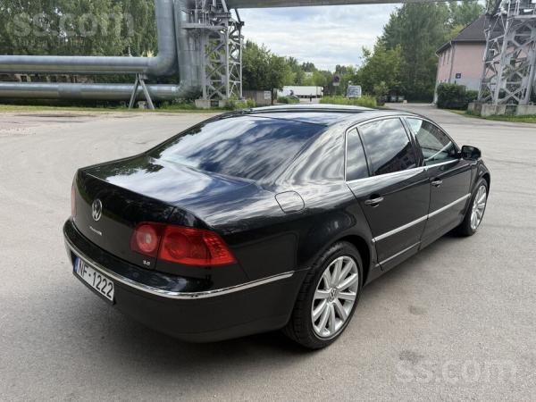 Black Volkswagen Phaeton 2010 in Riga, with an engine capacity of 3.00 L and mileage of 202 thousand km for 6490 €, photo 8 on AUTOMOTO.COM.LV