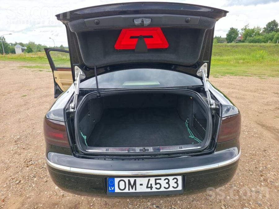 Black Volkswagen Phaeton 2010 in Daugavpils, with an engine capacity of 3.00 L and mileage of 343 thousand km for 7300 €, photo 23 on AUTOMOTO.COM.LV