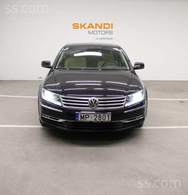 Black Volkswagen Phaeton 2011 in Riga, with an engine capacity of 3.00 L and mileage of 299 thousand km for 5790 €, photo 2 on AUTOMOTO.COM.LV