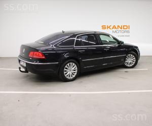 Black Volkswagen Phaeton 2011 in Riga, with an engine capacity of 3.00 L and mileage of 299 thousand km for 5790 €, photo 4 on AUTOMOTO.COM.LV