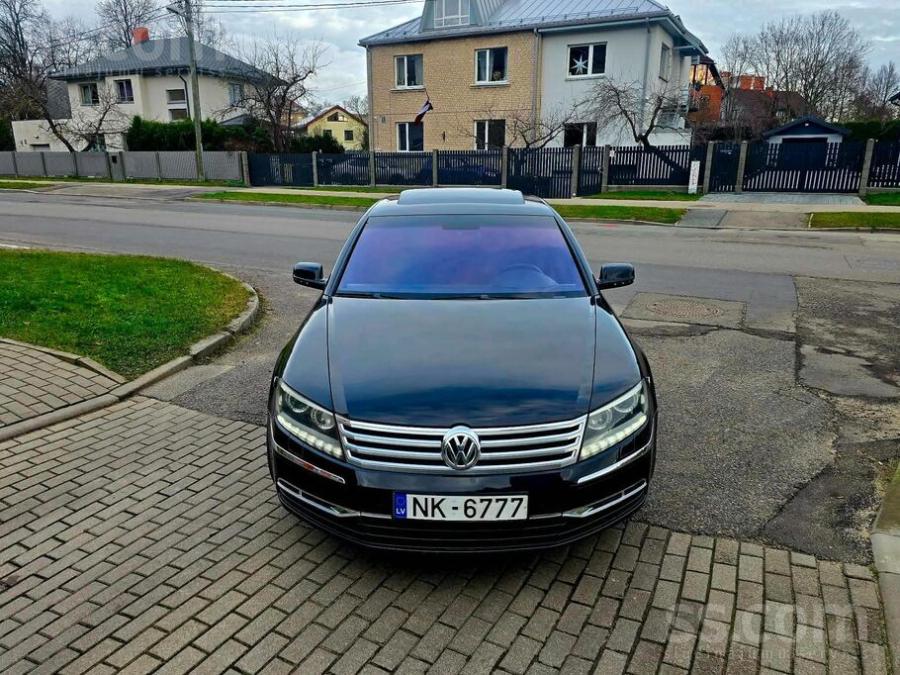 Black Volkswagen Phaeton 2011 in Riga, with an engine capacity of 3.00 L and mileage of 257 thousand km for 8800 €, photo 4 on AUTOMOTO.COM.LV