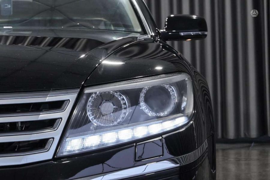 Black Volkswagen Phaeton 2013 in Marijampole, with an engine capacity of 2.97 L and mileage of 246 thousand km for 7950 €, photo 7 on AUTOMOTO.COM.LV
