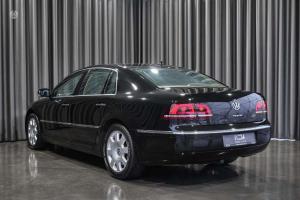 Black Volkswagen Phaeton 2013 in Marijampole, with an engine capacity of 2.97 L and mileage of 246 thousand km for 7950 €, photo 8 on AUTOMOTO.COM.LV
