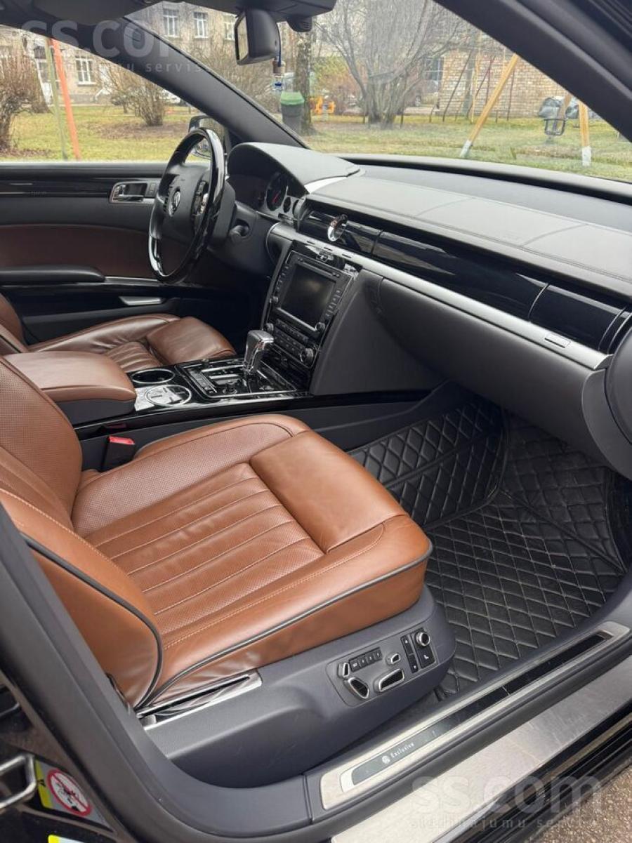 Melns Volkswagen Phaeton 2013 Rīga, ar dzinēja tilpumu 3.00 L un nobraukumu 270 tūkst. km par 15800 €, foto 6 vietnē AUTOMOTO.COM.LV