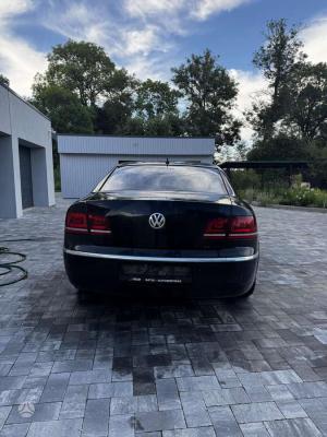 Melns Volkswagen Phaeton 2015 Anykščiai, ar dzinēja tilpumu 2.97 L un nobraukumu 193 tūkst. km par 6250 €, foto 12 vietnē AUTOMOTO.COM.LV