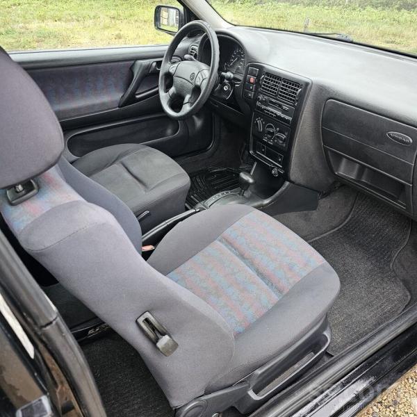 Melns Volkswagen Polo 1997 Rīga, ar dzinēja tilpumu 1.40 L un nobraukumu 290 tūkst. km par 780 €, foto 8 vietnē AUTOMOTO.COM.LV