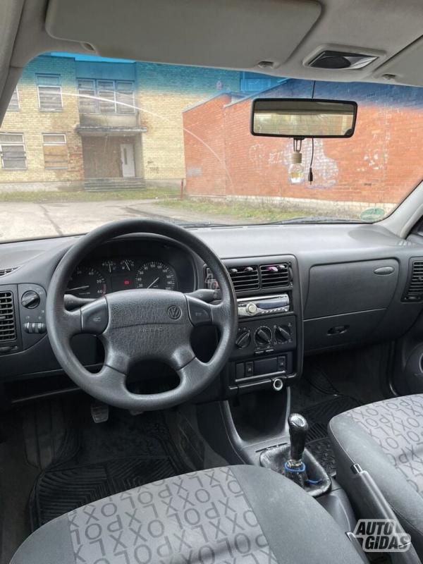 Melns Volkswagen Polo 1998 Druskininkai, ar dzinēja tilpumu 1.40 L un nobraukumu 220 tūkst. km par 650 €, foto 10 vietnē AUTOMOTO.COM.LV