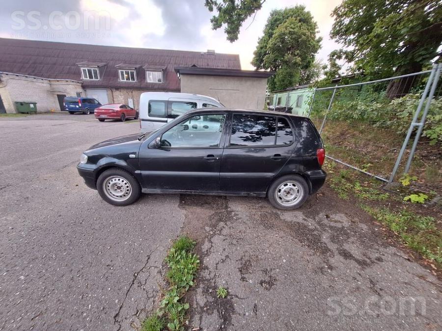 Black Volkswagen Polo 2000 in Riga, with an engine capacity of 1.40 L and mileage of 246 thousand km for 600 €, photo 1 on AUTOMOTO.COM.LV