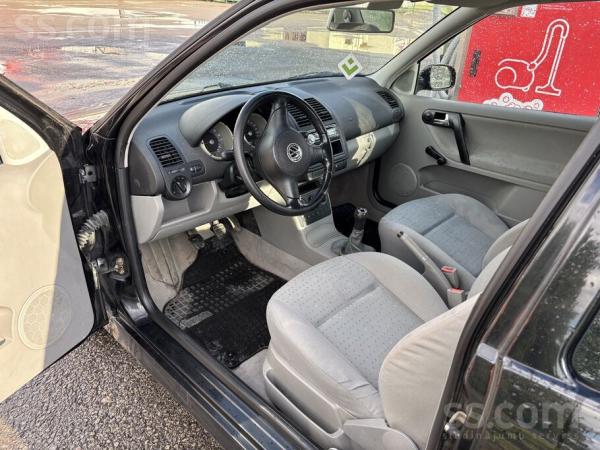 Melns Volkswagen Polo 2001 Rīga, ar dzinēja tilpumu 1.40 L un nobraukumu 190 tūkst. km par 649 €, foto 7 vietnē AUTOMOTO.COM.LV
