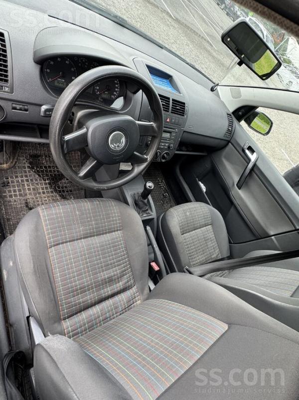Melns Volkswagen Polo 2006 Rīga, ar dzinēja tilpumu 1.20 L un nobraukumu 167 tūkst. km par 1300 €, foto 7 vietnē AUTOMOTO.COM.LV