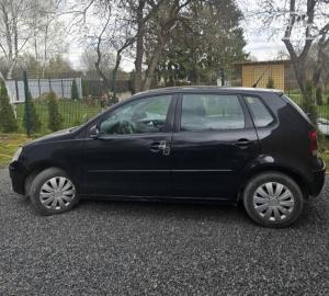 Black Volkswagen Polo 2008 in Vilnius, with an engine capacity of 1.40 L and mileage of 211 thousand km for 1350 €, photo 4 on AUTOMOTO.COM.LV