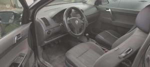 Black Volkswagen Polo 2009 in Siauliai, with an engine capacity of 1.20 L and mileage of 184 thousand km for 950 €, photo 9 on AUTOMOTO.COM.LV