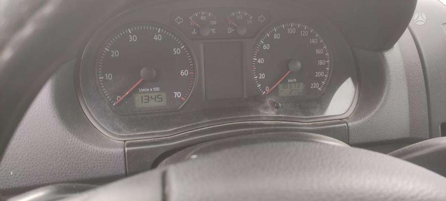 Black Volkswagen Polo 2009 in Siauliai, with an engine capacity of 1.20 L and mileage of 184 thousand km for 950 €, photo 11 on AUTOMOTO.COM.LV