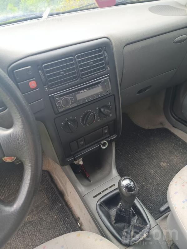 Grey Volkswagen Polo 1999 in Cesis, with an engine capacity of 1.40 L and mileage of 233 thousand km for 550 €, photo 4 on AUTOMOTO.COM.LV