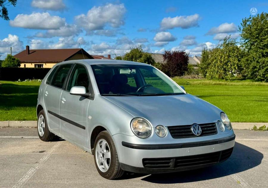 Grey Volkswagen Polo 2004 in Klaipeda, with an engine capacity of 1.40 L and mileage of 202 thousand km for 1399 €, photo 15 on AUTOMOTO.COM.LV